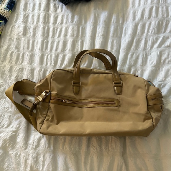 Tumi | Bags | Tumi Vista Collection Gold Carry On Duffel Never Used ...